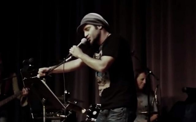 Iran rapper strips for prisoners' rights | The Times of Israel