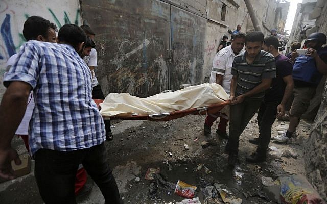 Amid bloodshed, frenetic Gaza hospital improvises | The Times of Israel