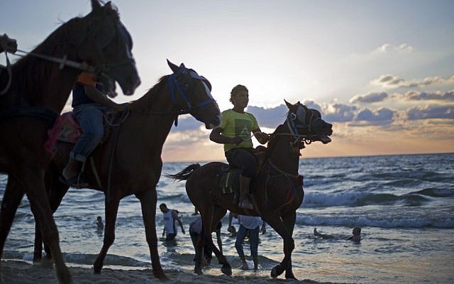 Gazans rush to enjoy life after ruinous war | The Times of Israel