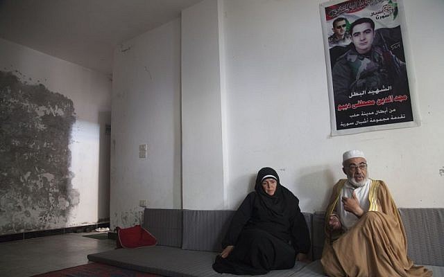 Four years into civil war, Syrians in regime areas soldier on | The ...