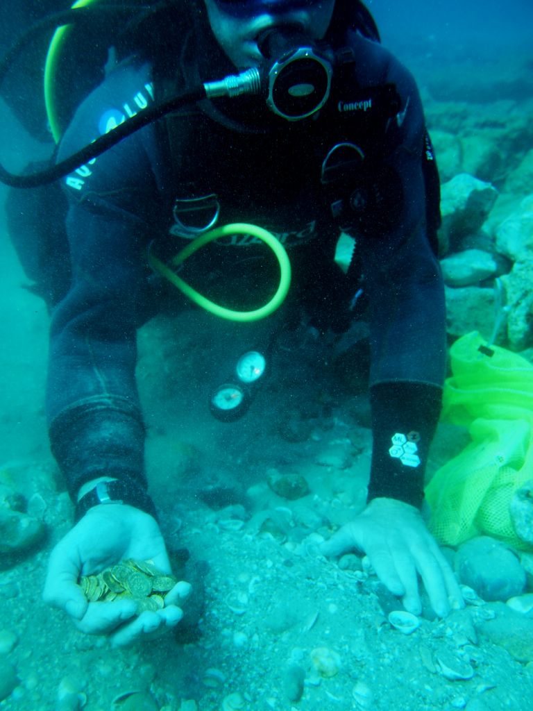 Massive trove of ancient gold coins found off coast | The Times of Israel
