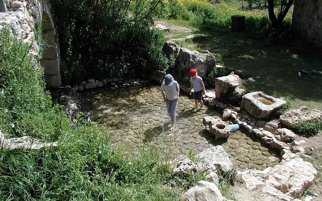 Walk through clear water at Tzuba's ancient underground spring | The ...