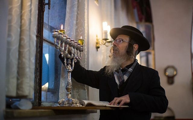 Millions of Jews light first candle of Hanukkah, the 'festival of ...