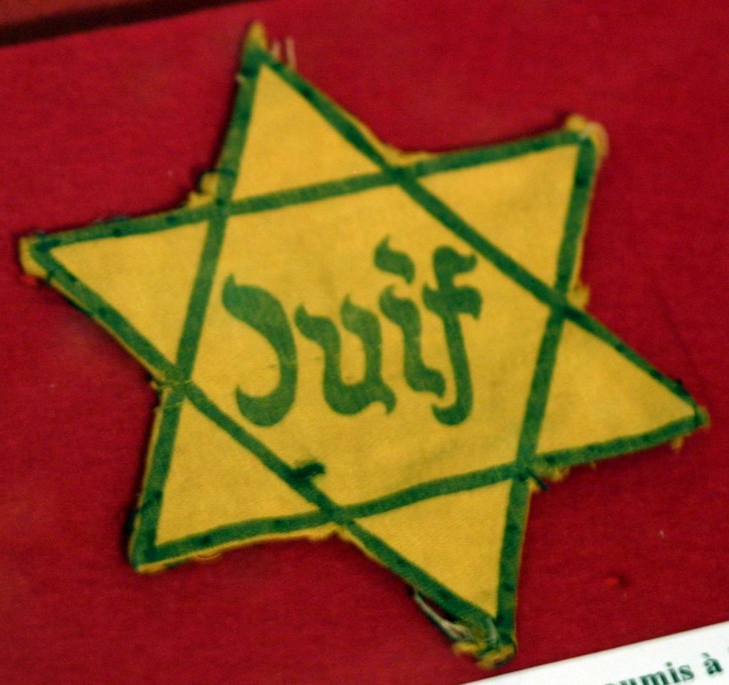 UK asylum seeker wristbands likened to Jewish yellow stars | The Times ...