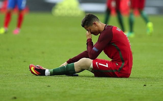 Portugal stuns host France to win Euro 2016 despite Ronaldo injury ...
