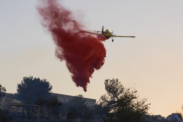 Israelis reach out to Haifa's 75,000 fire-ravaged homeless | The Times ...