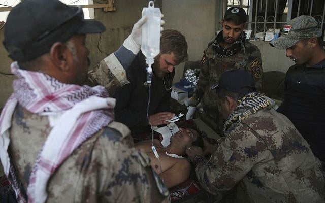 Iraq hospital brimming with Mosul civilian, army casualties | The Times ...