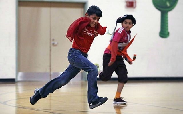 Armless Syrian boy thrives in US, hopes family can join him | The Times ...