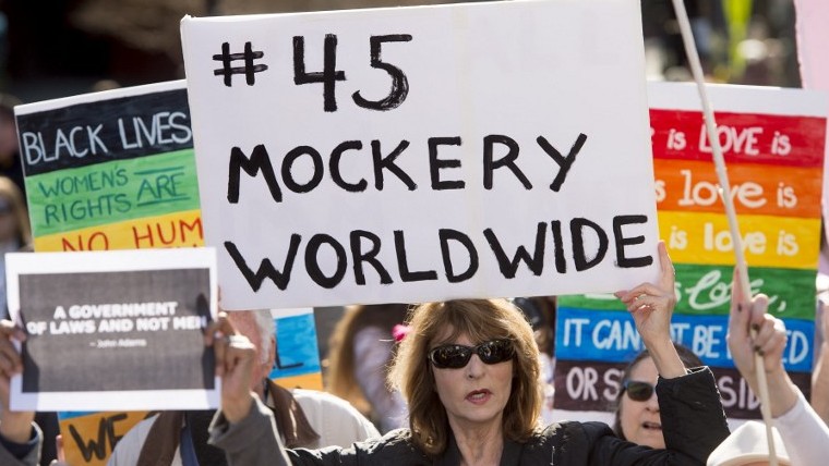 Thousands of anti-Trump protesters across US say 'not my president ...