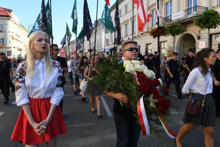 Activists block far-right march on Poland's Army Day | The Times of Israel