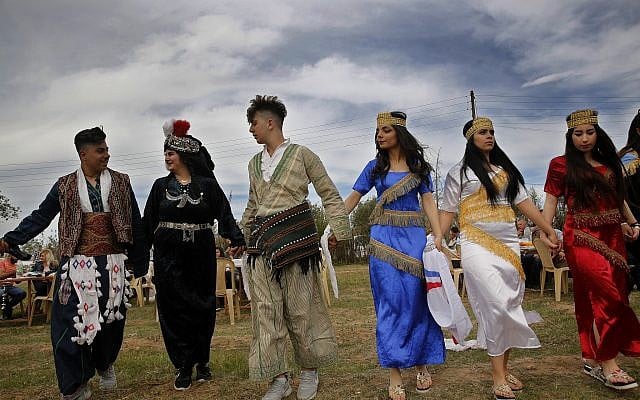 Syria's tiny Assyrian community celebrates its survival | The Times of ...