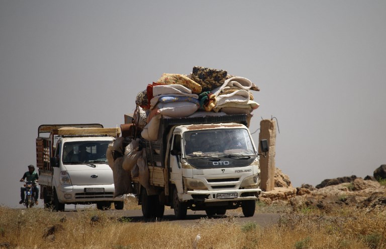 Families flee as Syria regime bombards southern city | The Times of Israel