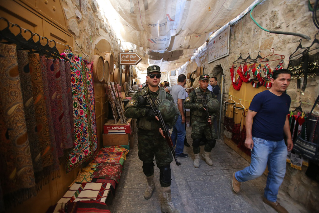 Armed, uniformed PA forces tour Israeli-controlled area of Hebron for ...