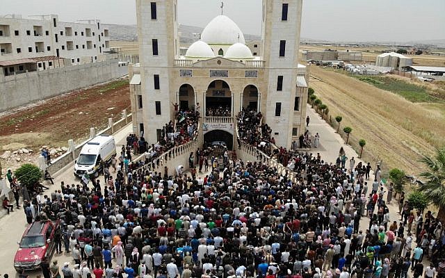 Hundreds attend funeral of Syrian soccer goalkeeper who became rebel ...