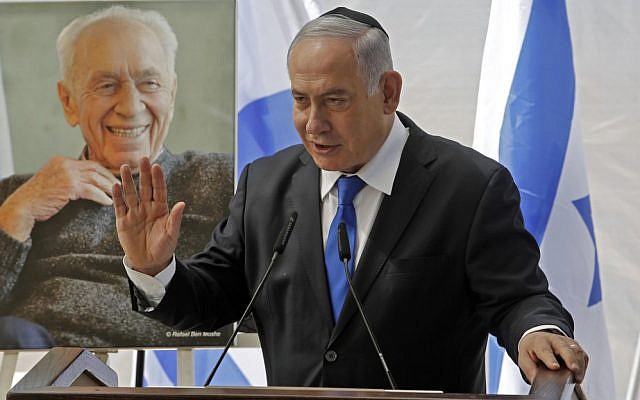 As Netanyahu offers Gantz a hand in unity, his fingers are crossed ...