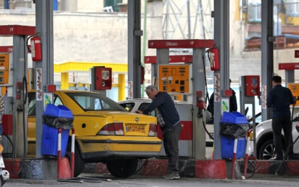 Protests strike Iranian cities over gasoline price hike | The Times of ...