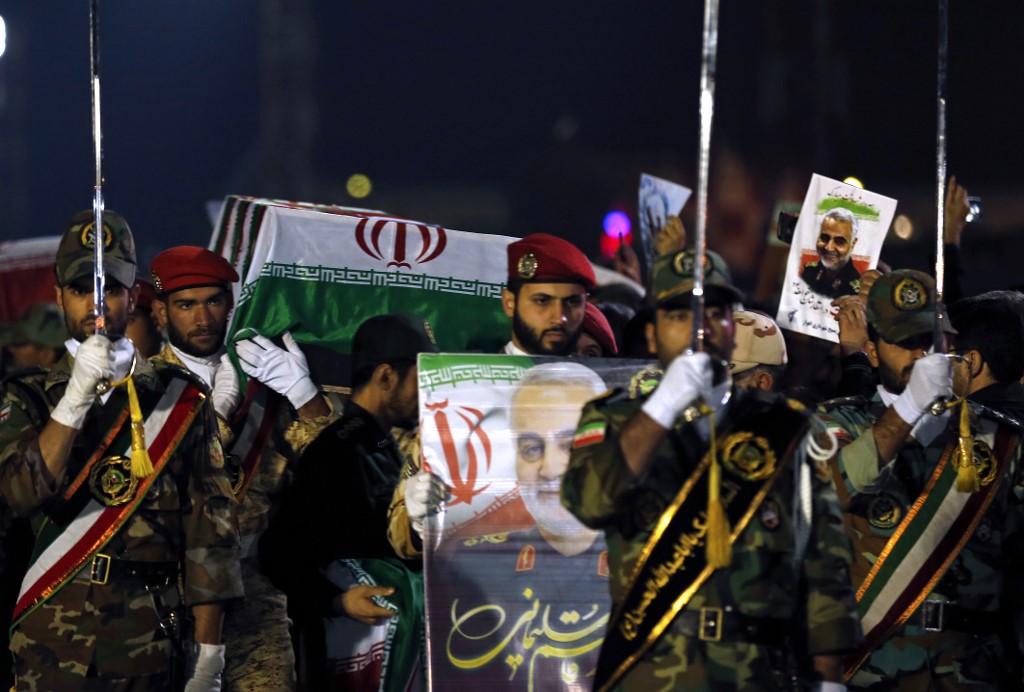Crowds throng Iran city to mourn Soleimani, vow revenge, as body is ...