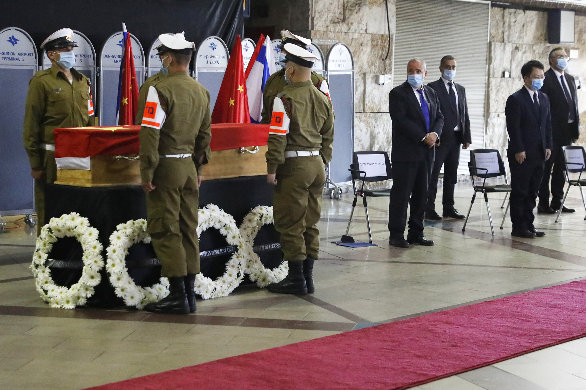 Israel honors dead Chinese envoy, as his body begins the journey home ...