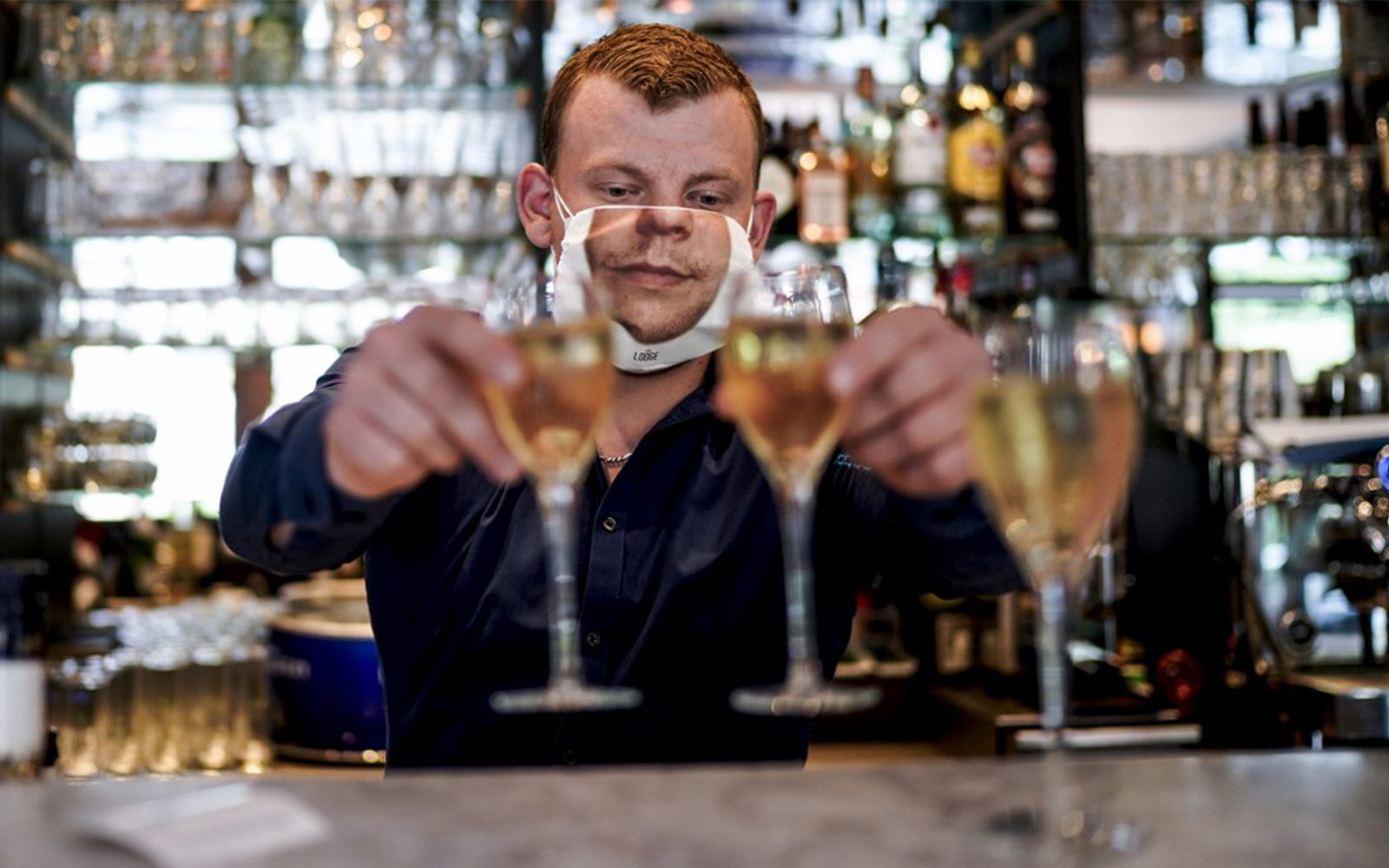 Printed masks put smile on Belgian faces as lockdown ends | The Times ...