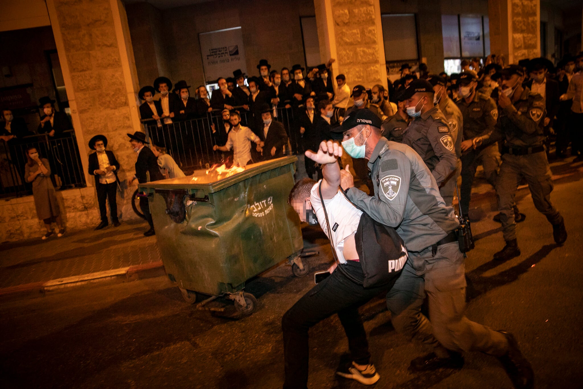 Police suspend officer filmed shoving unsuspecting Haredi man at ...