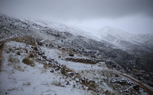 Snow, rain hit Israel in winter spell, raising Sea of Galilee level ...