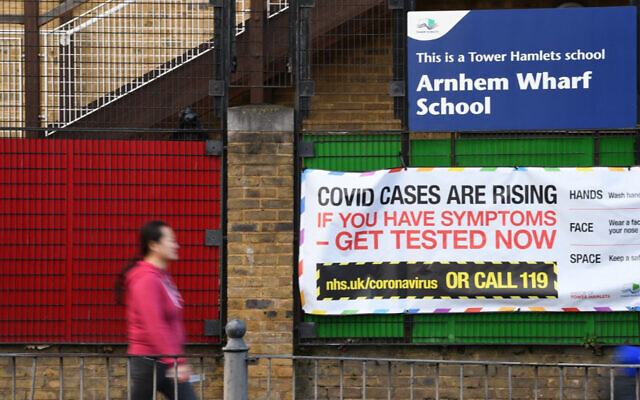 England imposes six-week lockdown, closing schools, as COVID cases ...