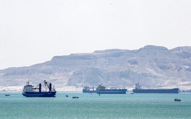 Suez Canal Authority hopes high tide from full moon can help free stuck ...