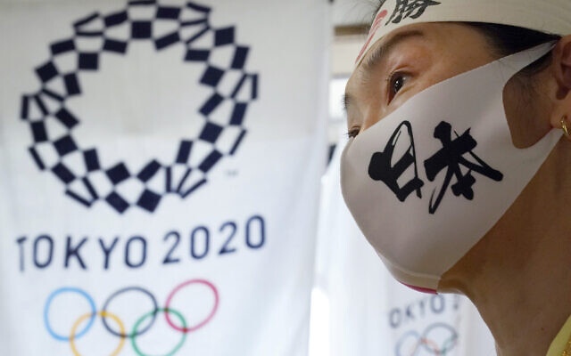 With fans kept out of venues, Olympic superfan brings the Games home ...