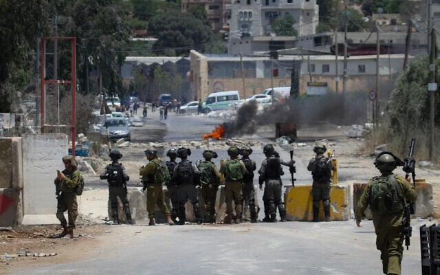 Palestinian killed by Israeli fire near West Bank outpost | The Times ...