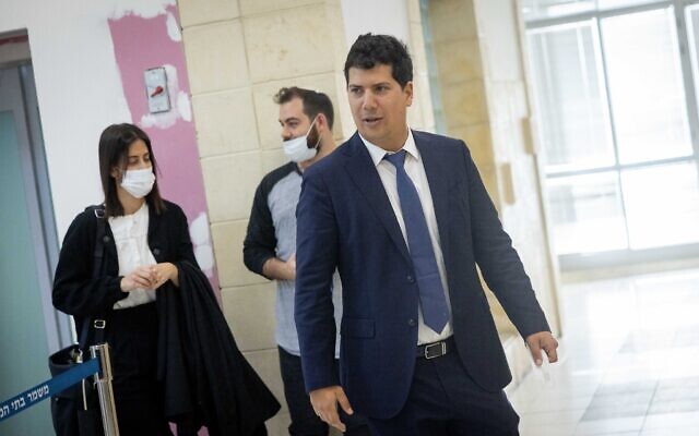 Ex-Netanyahu aide cries in court recalling arrest, says testimony is ...