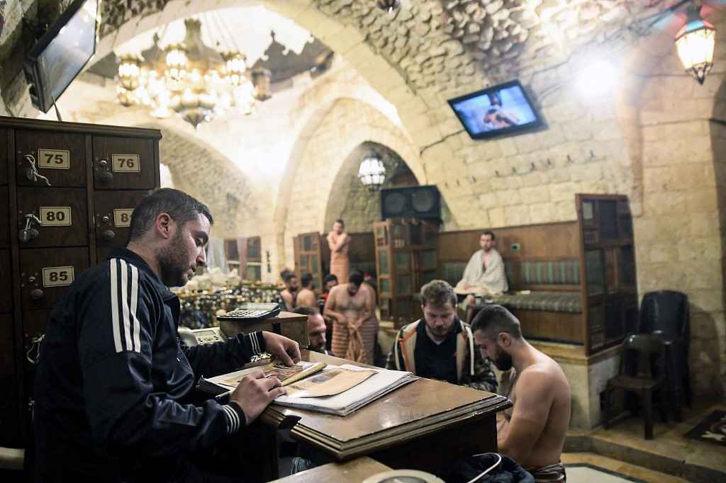 With no hot showers, Syria power crisis sends men to centuries-old ...