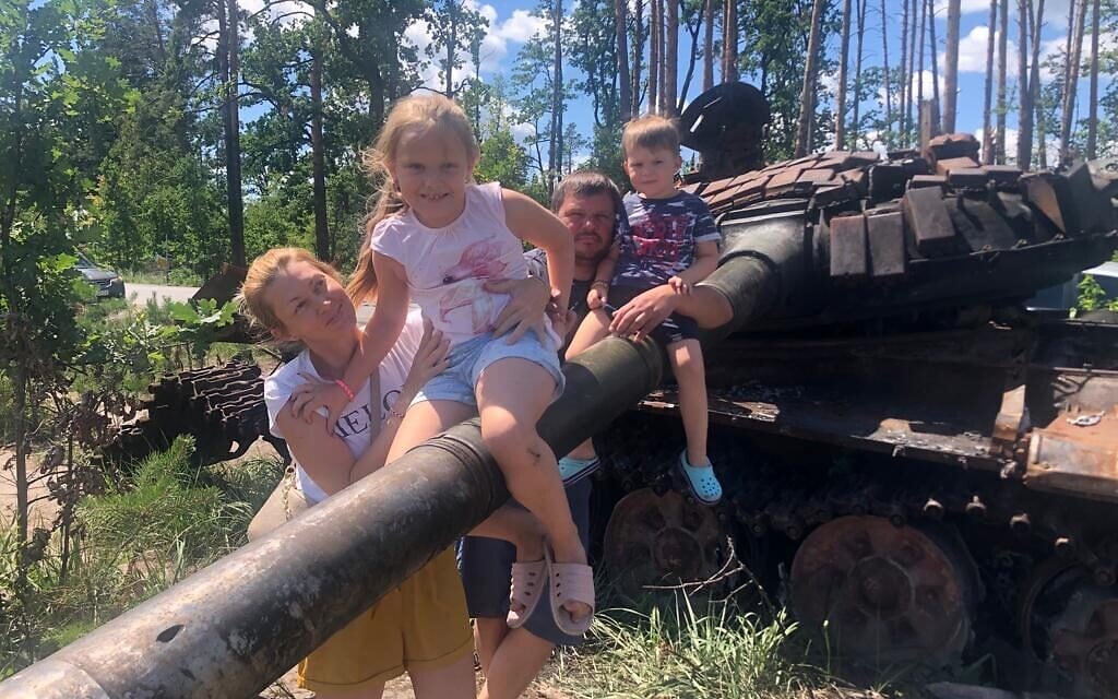 Rage, pride draw Ukrainian families to sightsee destroyed Russian tanks ...