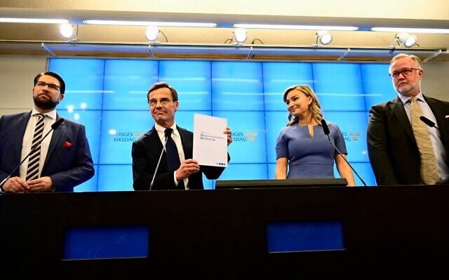 Swedish conservatives agree to form government with far-right backing ...