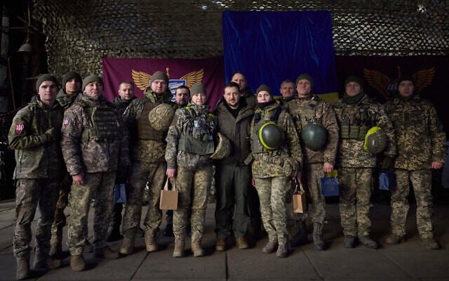 Defiant Zelensky visits Ukraine soldiers near frontline as drone strikes hit Russia | The Times ...