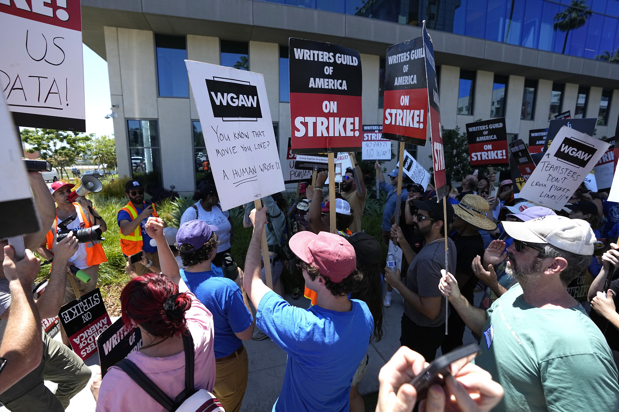 Actors to join screenwriters' strike, effectively shutting down ...