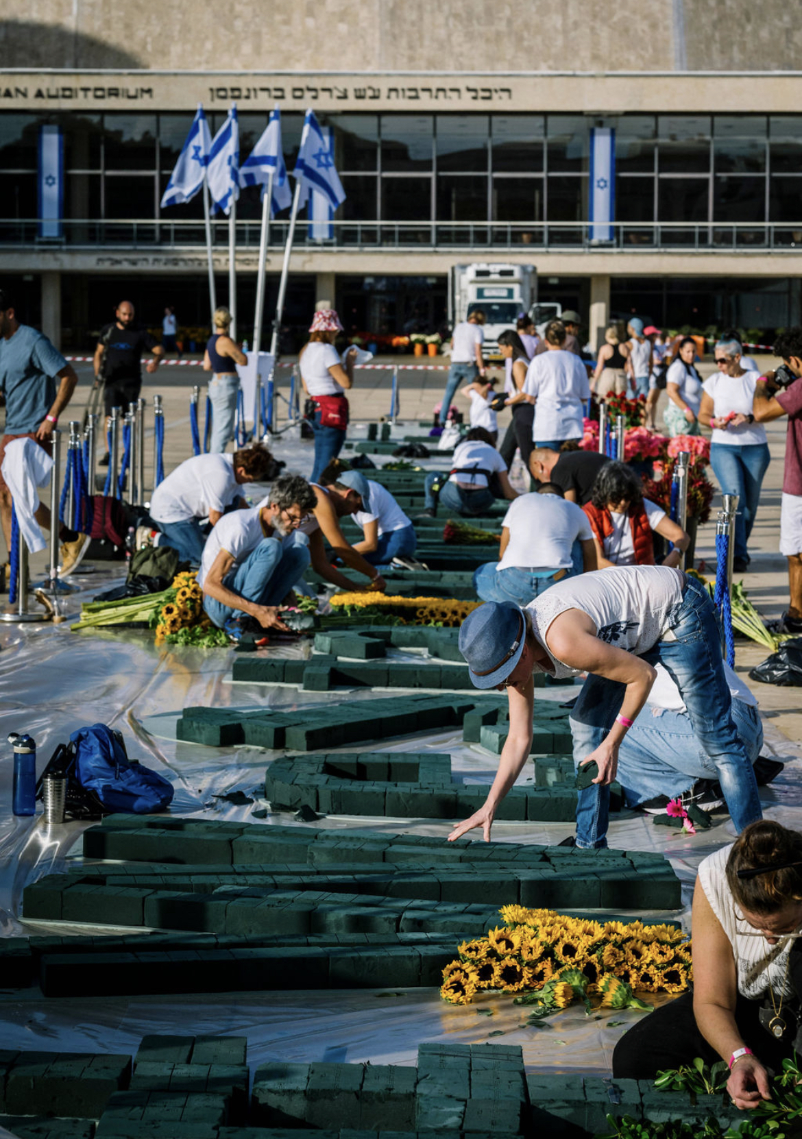 Thousands of flowers woven into words, in memory of Israelis killed ...
