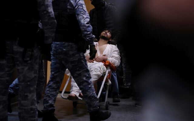 Battered and bruised, three of four Russia bombing suspects plead ...