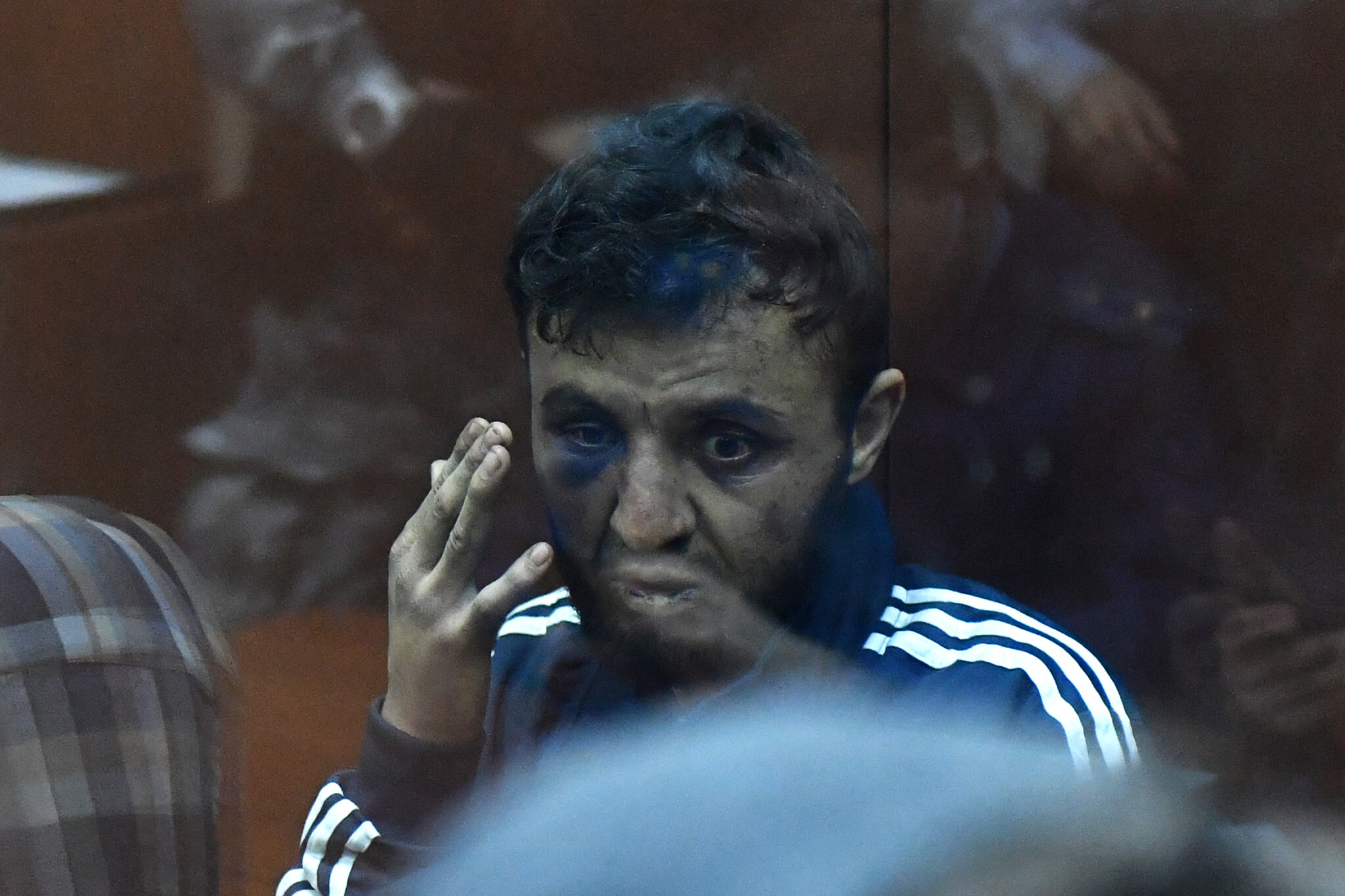 Battered and bruised, three of four Russia bombing suspects plead ...