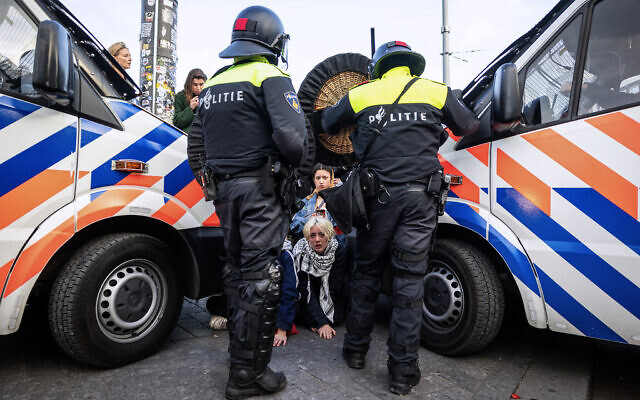 32 arrested after protesters clash with Dutch police in latest unrest ...