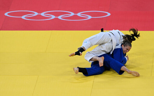 Israeli judoka Timna Nelson-Levy wins initial match in under-57kg ...