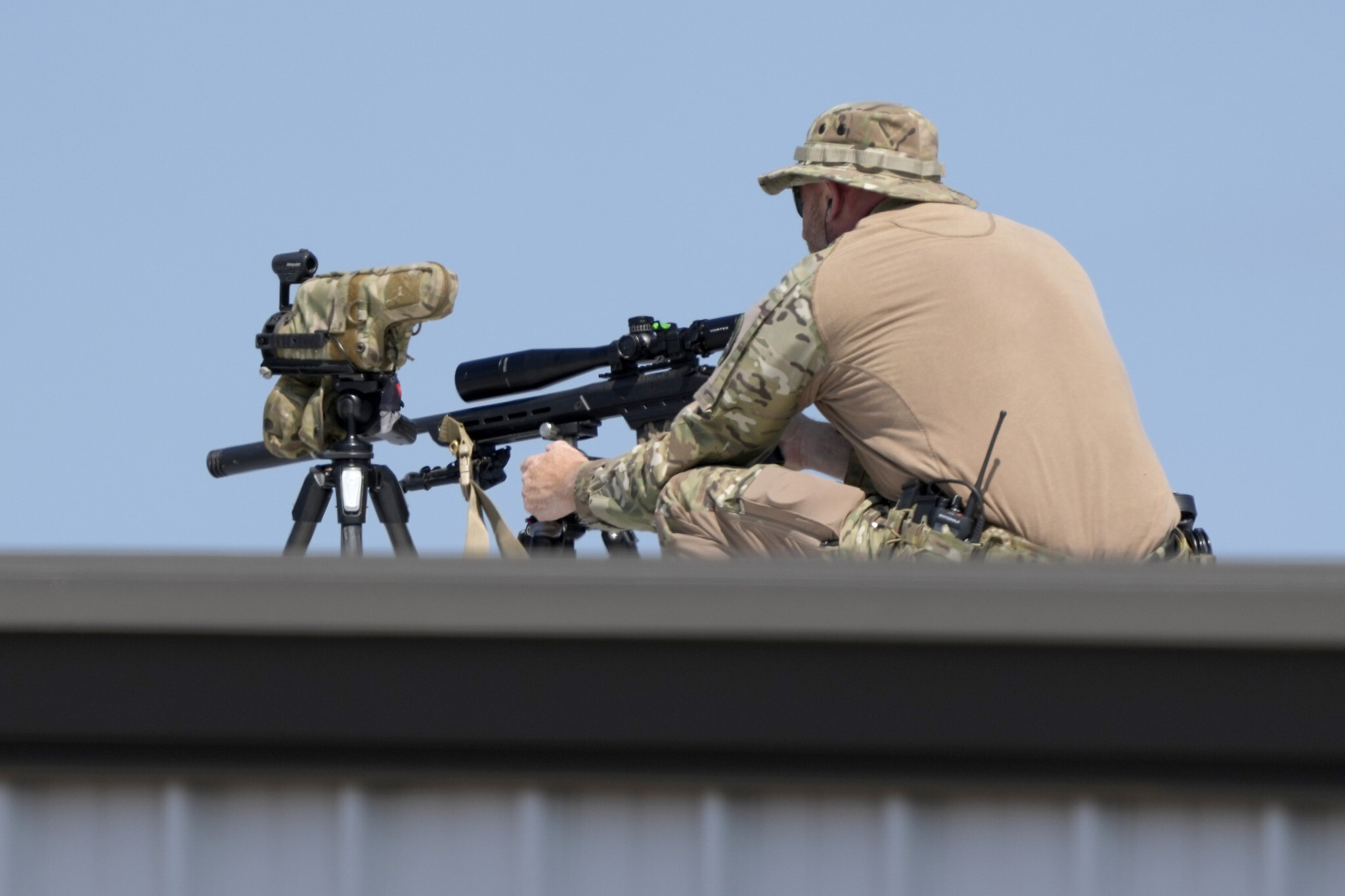 Trump speaks behind bulletproof glass at first outdoor rally since ...