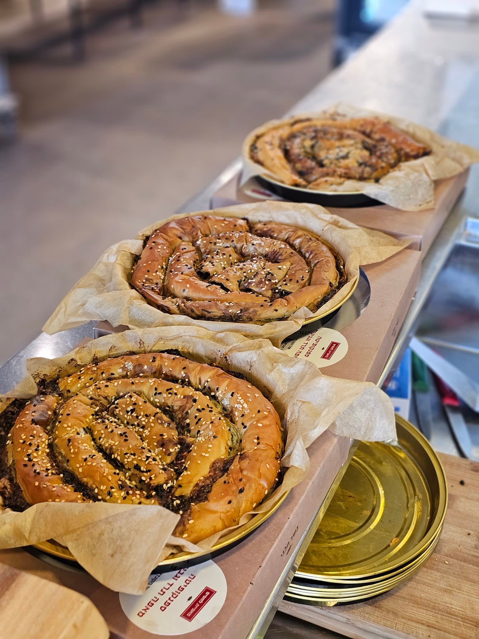 Can spinach pies infuse strength back into Kibbutz Be'eri? This baker hopes so | The Times of Israel