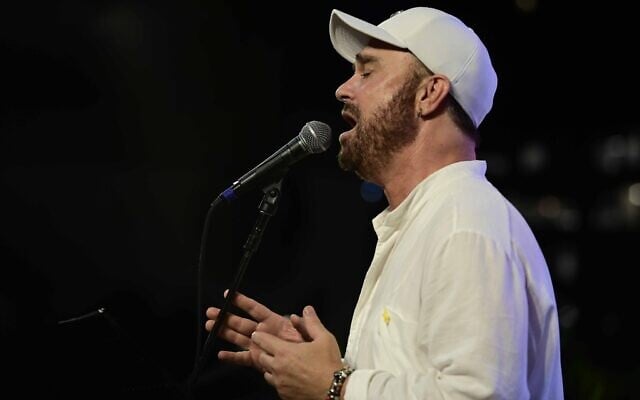 Pro-Palestinian activist throws red paint on Israeli singer at concert ...