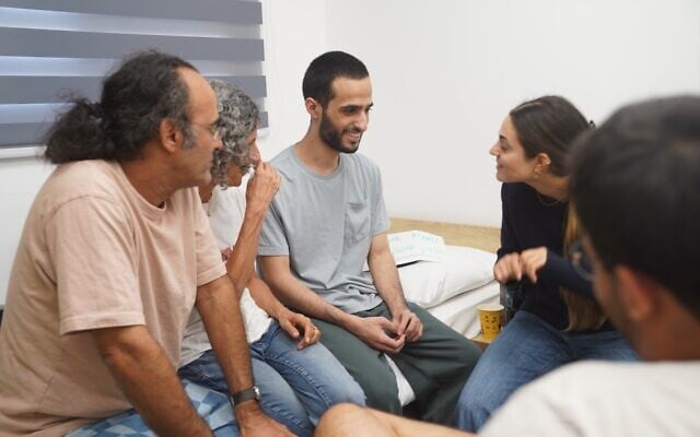 'My life, you hero!': Emotional videos show returned hostages reuniting ...
