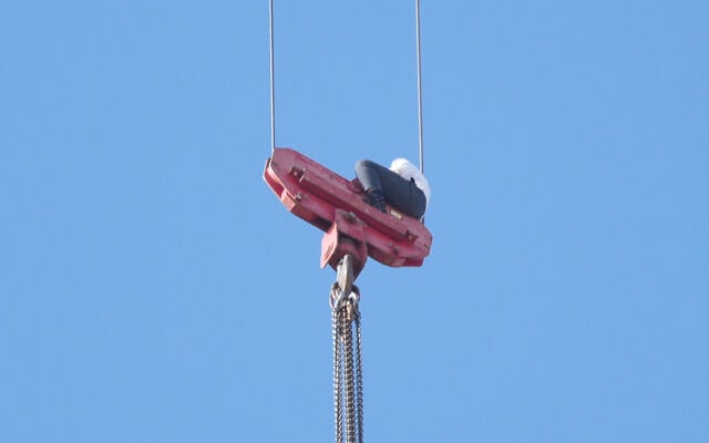 Firefighters rescue teenage boy hanging from crane 36 stories above ...
