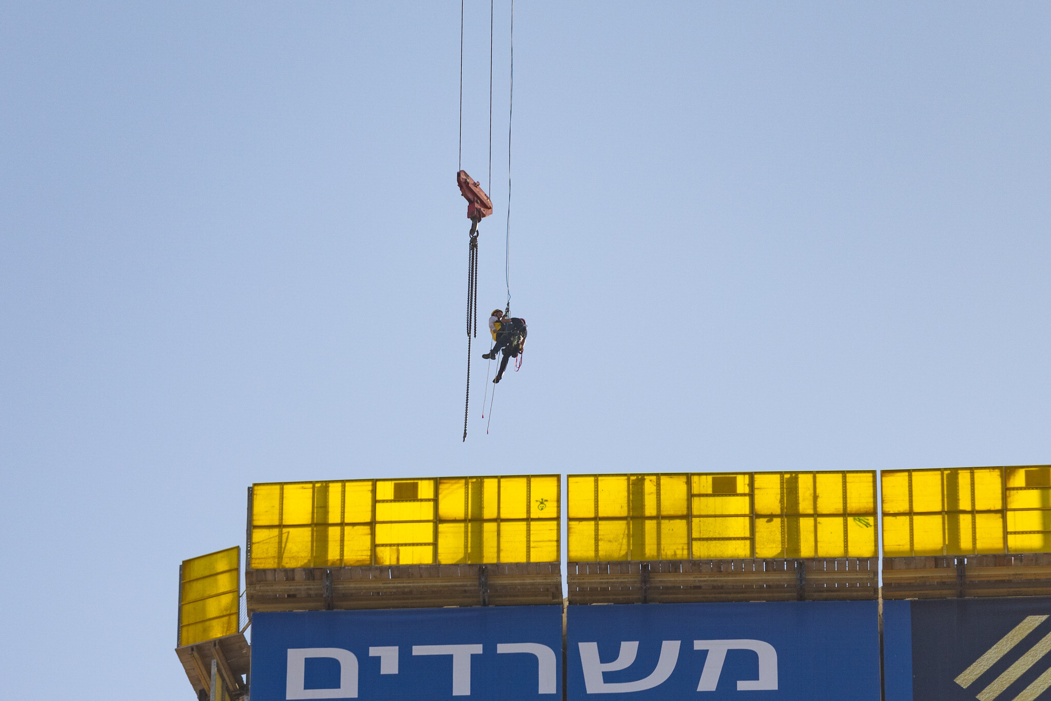 Firefighters rescue teenage boy hanging from crane 36 stories above ...