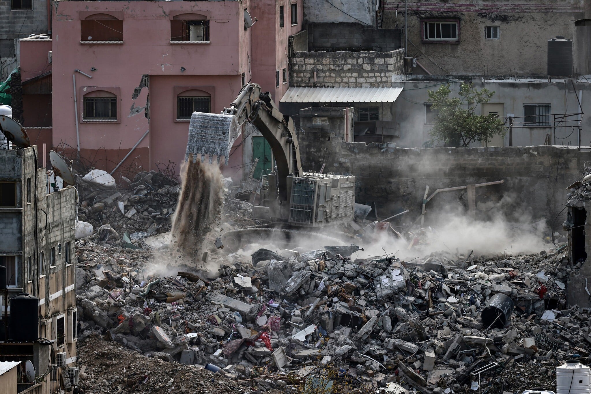 Israel begins demolishing 25 buildings in West Bank Palestinian refugee ...