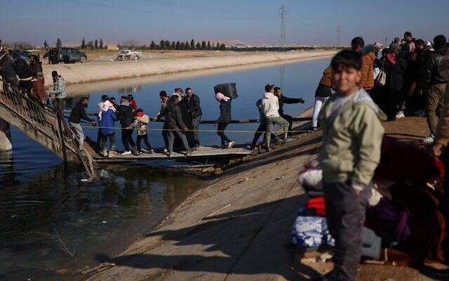 Hundreds flee to government-held areas in Syria ahead of possible ...