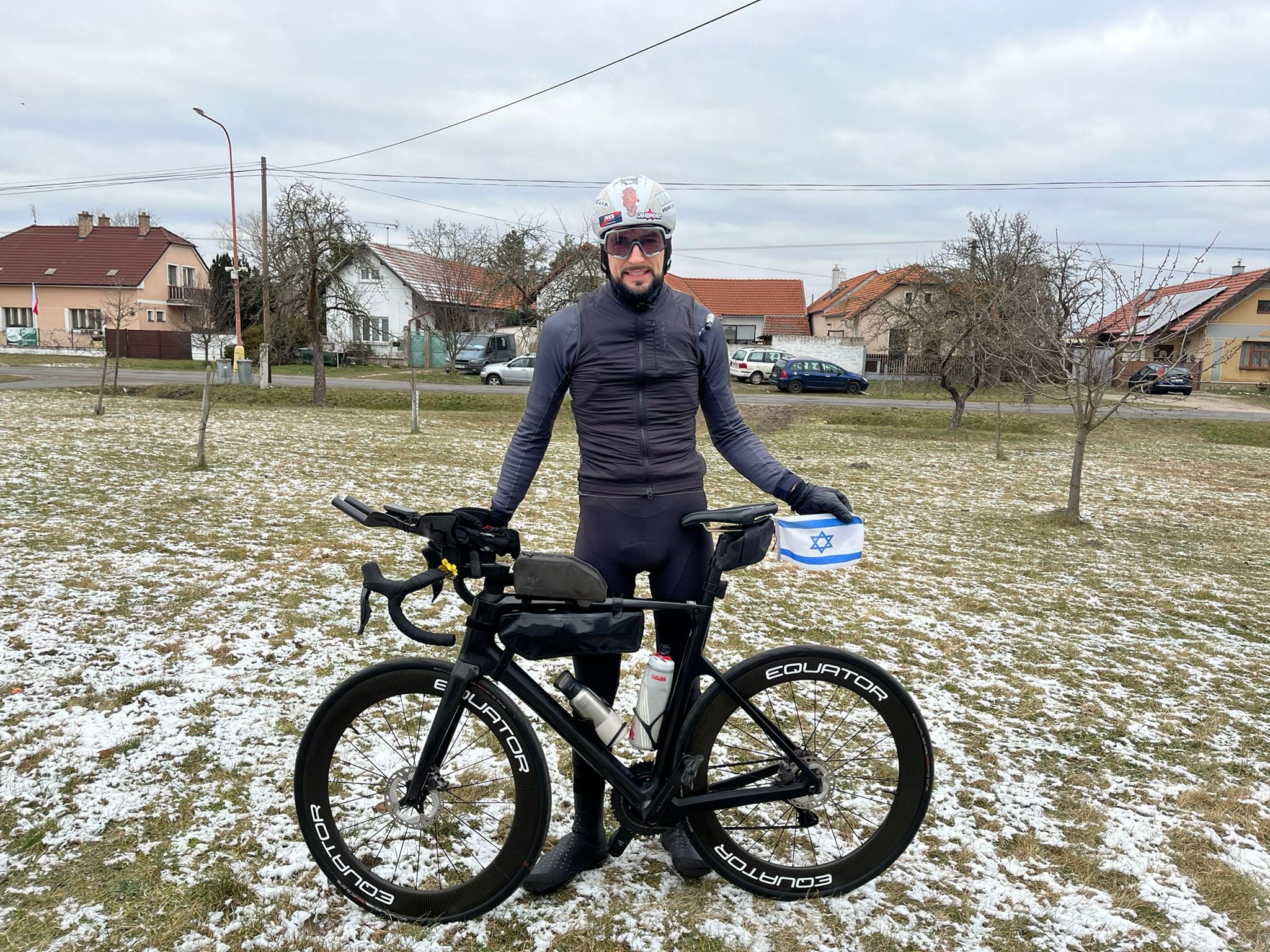 Cyclist completes 47-hour trek to write 'Never Again' around Auschwitz ...