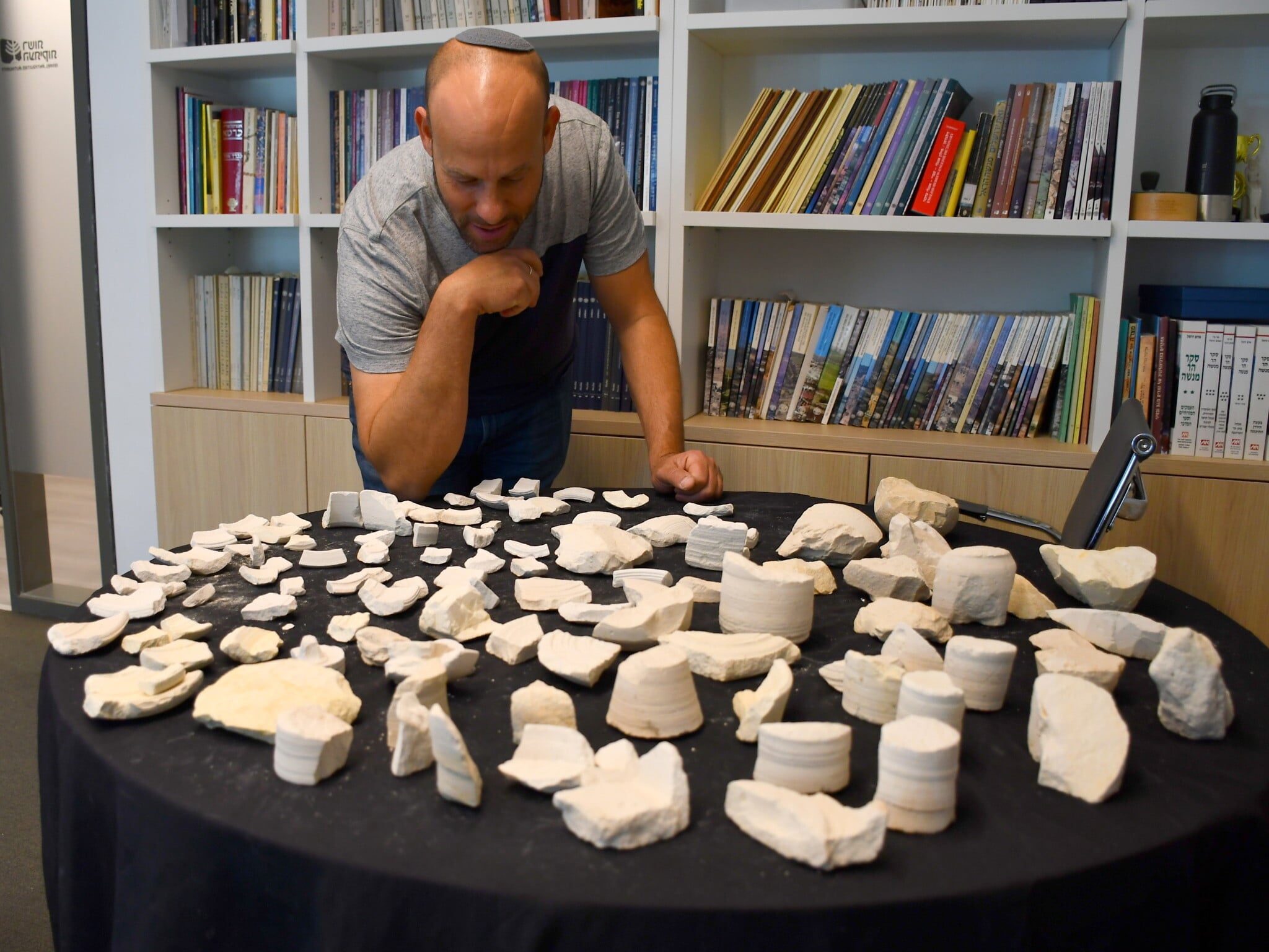 Tailing looters, archaeologists find 2,000-year-old stone vessel ...